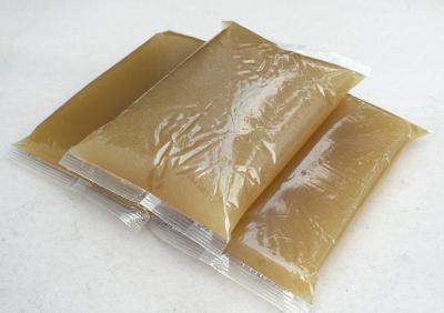 China Medium Speed Yellow Hot Jelly Adhesives Book Binding Glue For Box Making for sale
