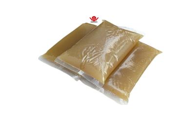 China Light Amber Fast Drying Hot Melt Adhesives Glue / Hot Jelly Glue For Paper Gluing for sale