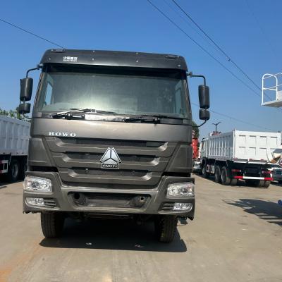 China Sinotruk LHD Used Dump Truck Trader 40t Howo 371 375 horse power manual for sale
