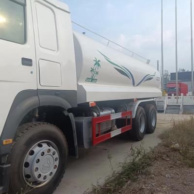 China Second hand HOWO sprinkler 371 20 cubic meters Used watering truck manual diesel for sale