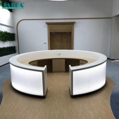 China JAFFA Custom Acrylic Round Reception Desk, LED Grid Illuminated Counter, Curved Service Desk for Hospital/Office/Commercial Space for sale