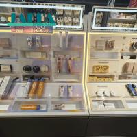 China JAFFA Custom Acrylic Beauty Store Display Counter, LED Lighted Brand Showcase, Transparent Acrylic Shelving for Makeup & Skincare for sale
