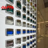 China Customizable Luminous Acrylic Display Rack – Precision-Fit Wall-Mounted Showcase for Ink Bottles for sale