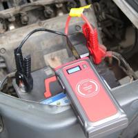 China Portable Jump Starter Power Pack With 15000mAh Battery LED Display Wireless Charging Protection System for sale