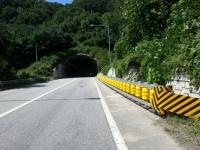 China Hot Dipped Galvanized Rolling Guardrail Barrier EVA Roller Material Grade International Level 4 Safety Barrier for Highway Traffic Control for sale