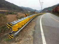 China Corrosion Resistance High Highway Roller Barrier for Mountain Roads Roller Size Diameter 245/350 Mm for sale
