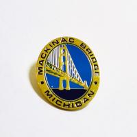 China 1.5 Inch Stamping Hard Enamel Lapel Pins Mackinac Bridge Design Oval Shape Gold Plating for sale