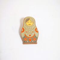 China Custom Epoxy Coated Antique Copper Russian Nesting Doll Lapel Pins 40x25mm Iron for sale
