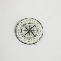 China Custom Iron Stamped Round Lapel Pins 1.25 Inch Compass Design Black Nickel Epoxy Coated for sale