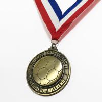 China Round Antique Bronze Soccer Metal Medal 2.5 Inch with 3D Blank Back and Polyester Ribbon for sale