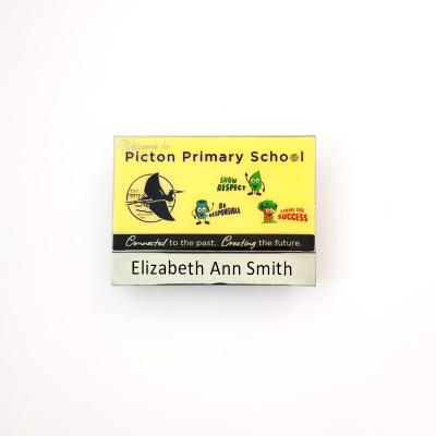 China Custom Metal Stamped Epoxy Domed School Badge 60x45mm with Printed Names for sale