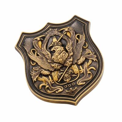 China Custom Shield Shape Die Struck Metal Pin 1.5 Inch Antique Gold Single Post Lapel Emblem for sale