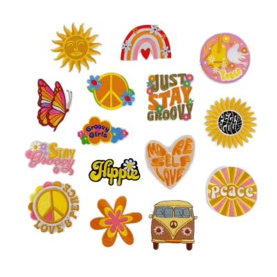 China Trendy Summer Sunflower Peace Embroidered Patches Orange Yellow Iron-On PVC Fabric Heart Flower Kids Clothing Bags Alphabet for sale