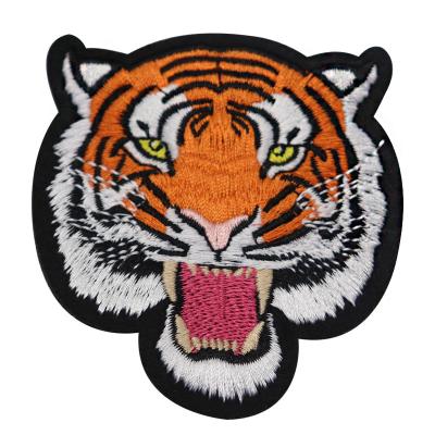 China Custom Design Tiger Embroidery Patch for Garments Eco-Friendly Fabric and PU Made From Durable Felt Material for sale