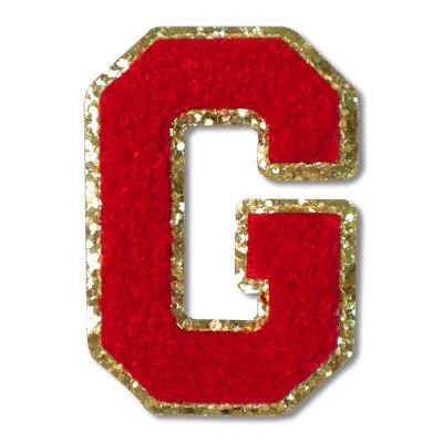 China Custom Iron-on Patches Sequin Chenille Embroidery Cross Patch Metal Band Alphabet Embroidered Iron-on Patches for sale