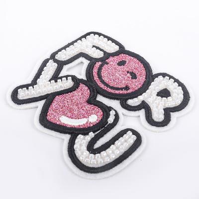 China New Design Beaded Glitter Embroidery Custom Pearl Letter Embroidery Iron on Bag Patch Beaded Patches for Clothing for sale