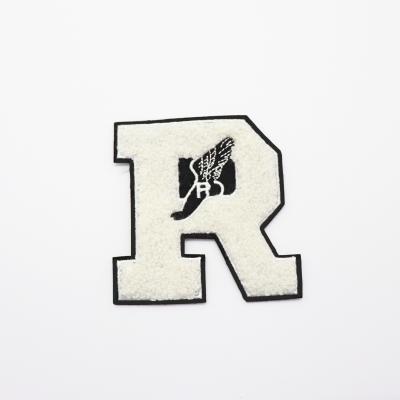 China Discount Price Gold Sequin Edge Letter Chenille Clothing Patch Embroidered Greek Letter Lace Decoration Fabric Main Material for sale