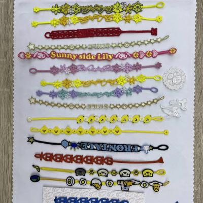 China Customized Embroidered Exile Water Bracelet Personalized Hollow Canvas Adjustable Letter Bracelet Simple Style for sale