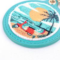 China Customized Leather Round High-Quality Keychain Backpack Pendant Embroidery Business Gifts for sale