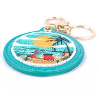 China Customized Leather Round High-Quality Keychain Backpack Pendant Embroidery Business Gifts for sale