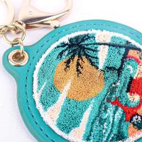 China Customized Leather Round High-Quality Keychain Backpack Pendant Embroidery Business Gifts for sale