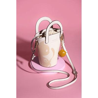 China Custom Logo Handbag Bohemian Style Ladies One-Shoulder Messenger Bag Bucket Bag Vegan Leather Messenger Bag for sale