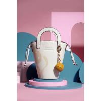 China Custom Logo Handbag Bohemian Style Ladies One-Shoulder Messenger Bag Bucket Bag Vegan Leather Messenger Bag for sale