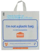 China 100% Compostable Carrier Plastic Biodegradable T-Shirt Bags With Logo, die cut handle cloth carrier shopping, shopper for sale