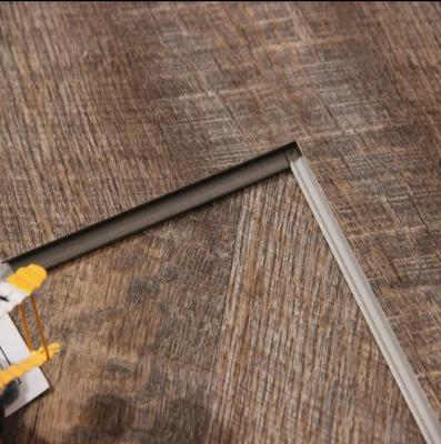 China Quick Install 2-6mm Thickness Noise Reduce SPC Floor Tiles and Vinyl Tiles for Easy Maintenance for sale