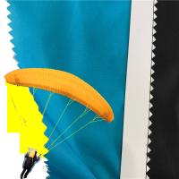 China Uniform Essential Lightweight And Waterproof Matte 100% Nylon Taslan Rip Stop Fabric for sale