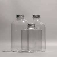 China Transparent Food Grade PET Plastic Bottles 250ml to 2L with Aluminum Cap BPA Free for sale