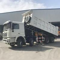 China Shacman 8X4 Dump Trucks for Heavy Machine LHD Cargo Tank Dimension 6800*2350*1600mm for sale