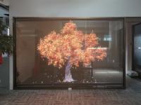 China Flexible 6mm Pixel LED Transparent Film Screen with IP65 Rating and Customizable Luminous Flux for Indoor Glass Side Use for sale