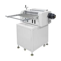 China White Silicone Rubber Band Cutting Machine 0.3kw 220V with 4000-7000 cycles/hour and 520mm cutting width for sale