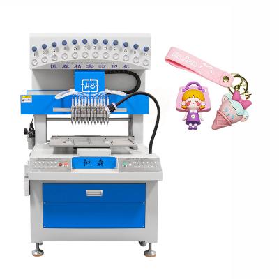 China 12 Colors PVC Dispenser Silicone Keychain Dripping Molding Machine 110V 220V for Patch Making for sale