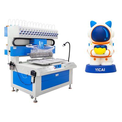 China 32 Colors PVC Silicone Rubber Keychain Doll Pendant Dispensing Machine 1300x1450x1600mm for sale