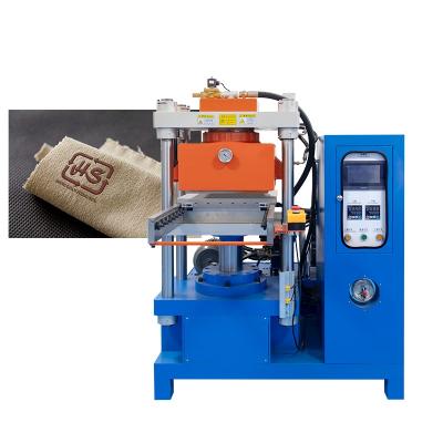 China 50T Vacuum Vulcanizing Heat Press Molding Machine for Silicone Label Patch Production for sale