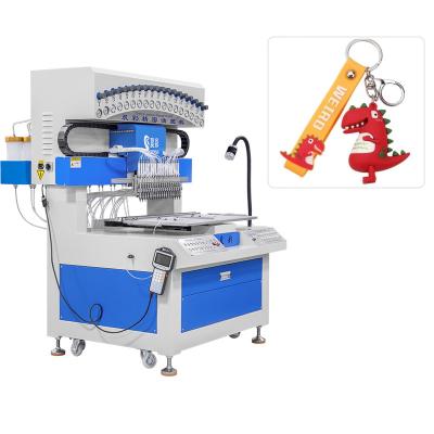 China 18 Colors Silicone Keychain Machine for Dispensing PVC Cartoon Figures Ornament for sale