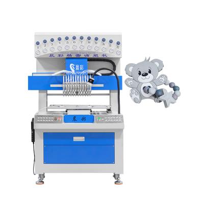 China 12 Colors PVC Trademark Logo Dripping Machine Silicone Bracelet Making Machine for sale