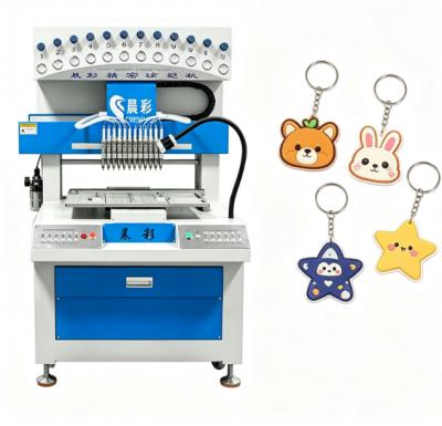 China Automatic 12 Colors Silicone Keychain Dispensing Machine Soft PVC 2D 3D Patch Dripping Machine for sale
