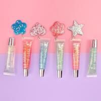 China Exquisite Childrens Lip Gloss 7ml Shimmering Glitter Lip Oil With Cute Pendant for sale