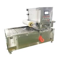 China Automatic Egg Tray Packing Machine 380V 5.5kW Food Tray Sealer 2000-2800 Trays Per Hour for sale
