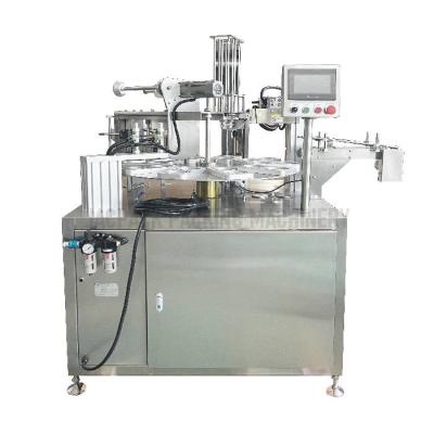 China Stainless Steel 304 Rotary Cup Filling Sealing Machine 16 Cups Min 1.8KW for sale