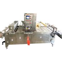 China Automatic Rice Tray Negative Pressure Sealing Machine 380V PLC Control 900mm Sealing Width for sale