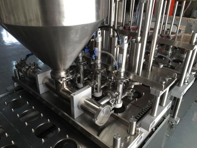 China Automatic Liquid Filling Machine Gas Flushing Cup Sealer 6 Cups Cycle for Food Packaging for sale
