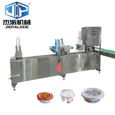 China Automatic Cup Sealing Machine 1800 Trays per Hour 380V 50Hz Stainless Steel for Food Beverage Industry for sale