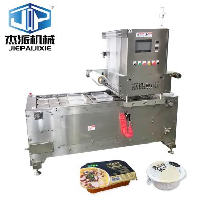 China Automatic Tray Sealing Machine 26 Trays/min Film Heat Sealing for PP PE PVC PET for sale