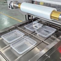 China Automatic Tray Sealing Machine 26 Trays/min Film Heat Sealing for PP PE PVC PET for sale