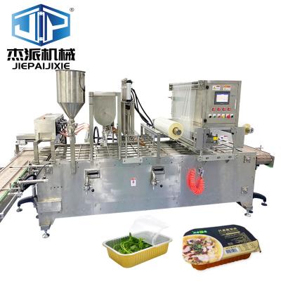 China Automatic Plastic Tray Filling and Sealing Machine 2400 Trays per Hour for Seafood for sale