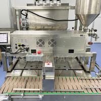China Automatic Plastic Tray Filling and Sealing Machine 2400 Trays per Hour for Seafood for sale